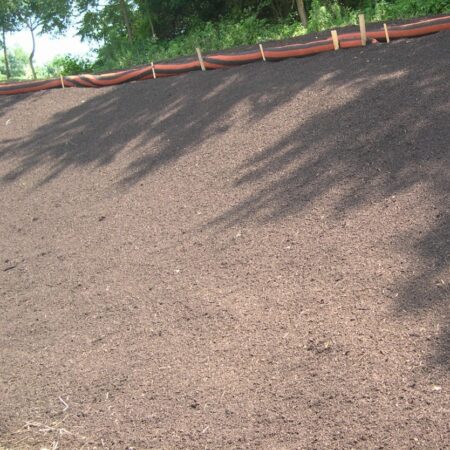 Compost Erosion Control Blanket on slope with Compost Filter Sock at Crown | SPVSoils | San ...